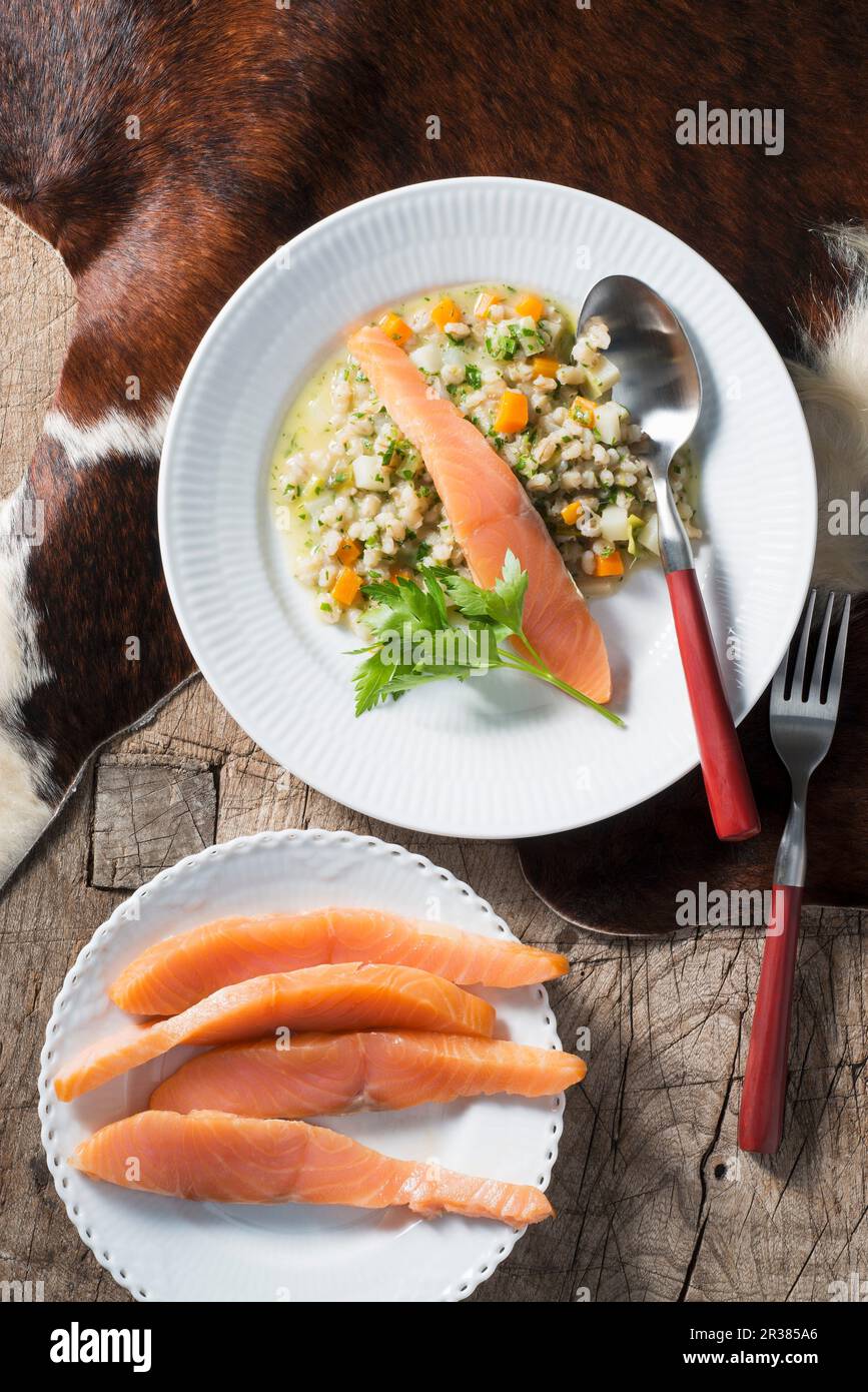 Smoked salmon with pearl barley risotto Stock Photo - Alamy