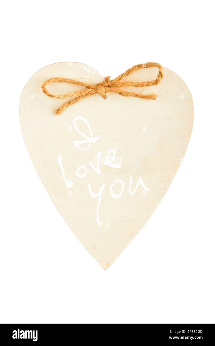 Painted wooden heart with rope isolated on white Stock Photo - Alamy