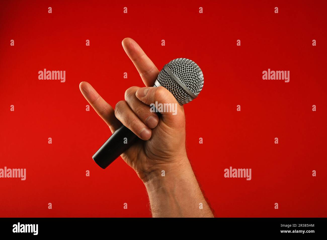 Singer microphone hand hi-res stock photography and images - Alamy