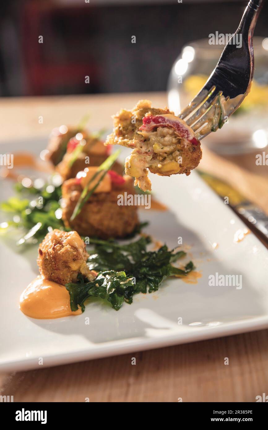 Pan fried corn fritters hi-res stock photography and images - Alamy