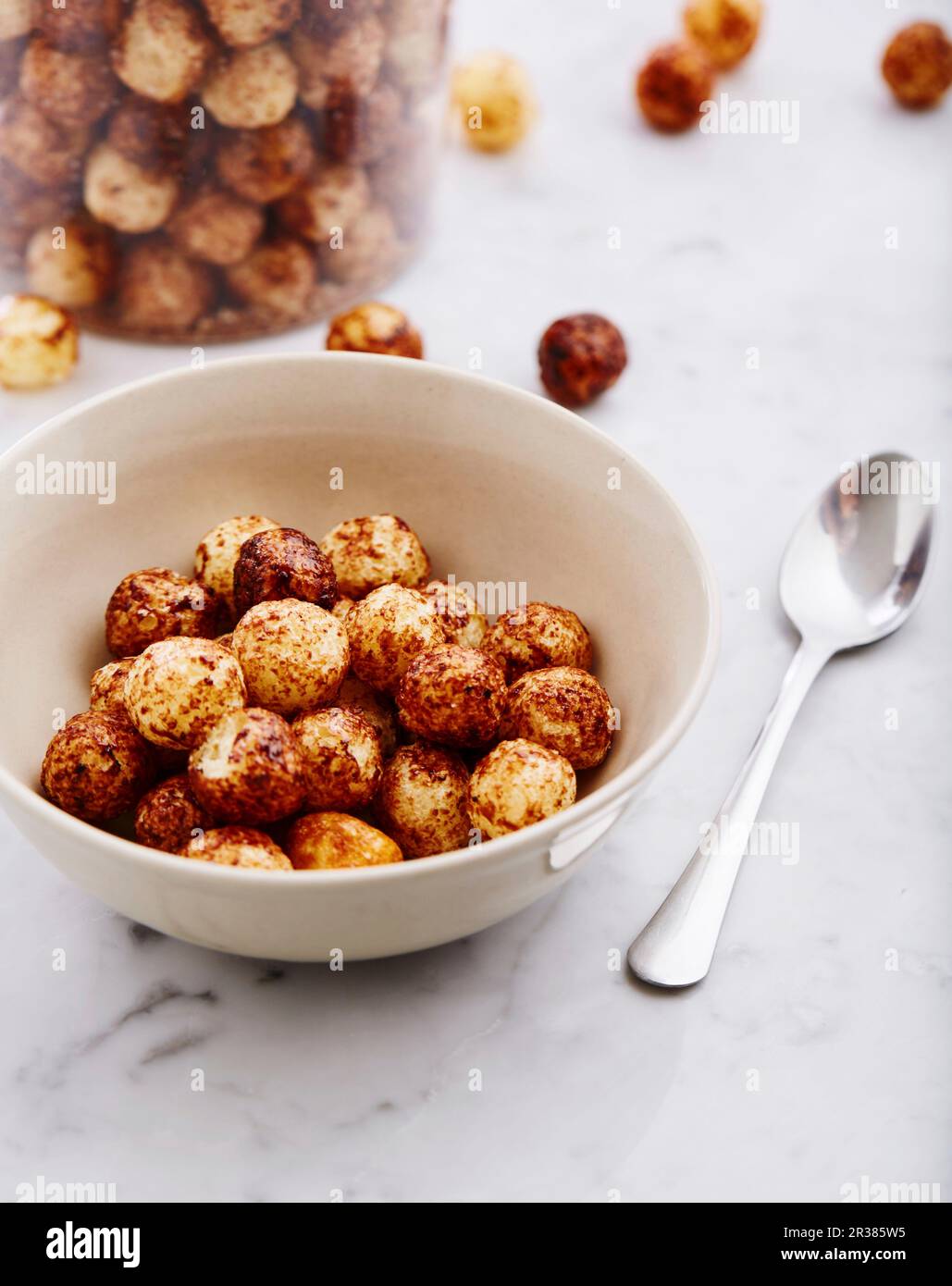 Corn pops in a small bowl Stock Photo - Alamy