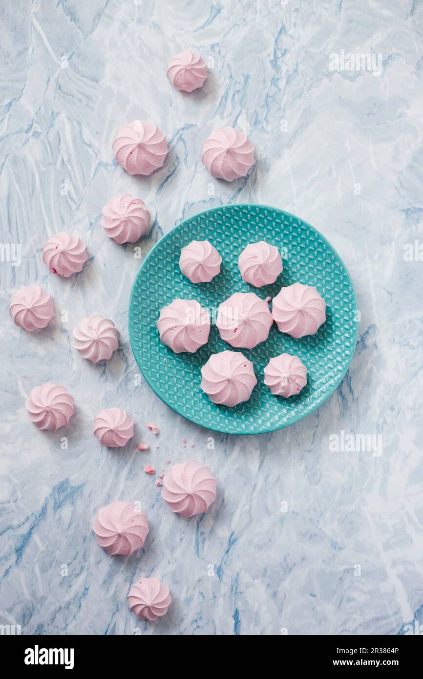 Pink mini meringues (seen from above Stock Photo - Alamy