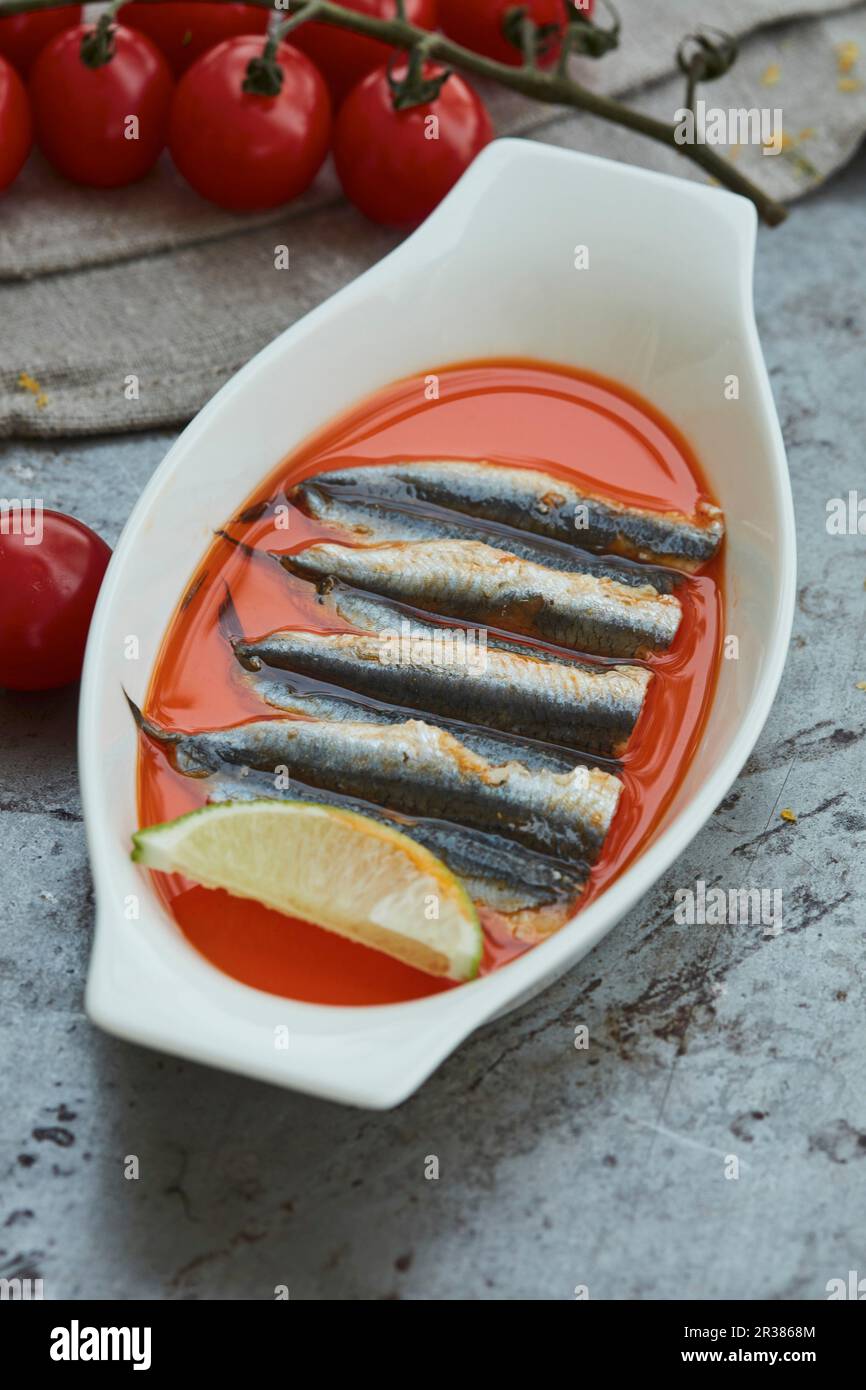Marinated sardines in a serving bowl Stock Photo - Alamy