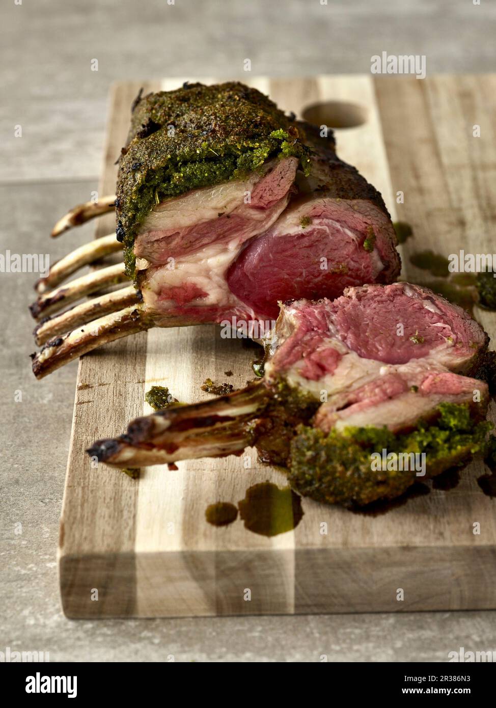 Grilled lamb chops with a herb crust, sliced Stock Photo - Alamy