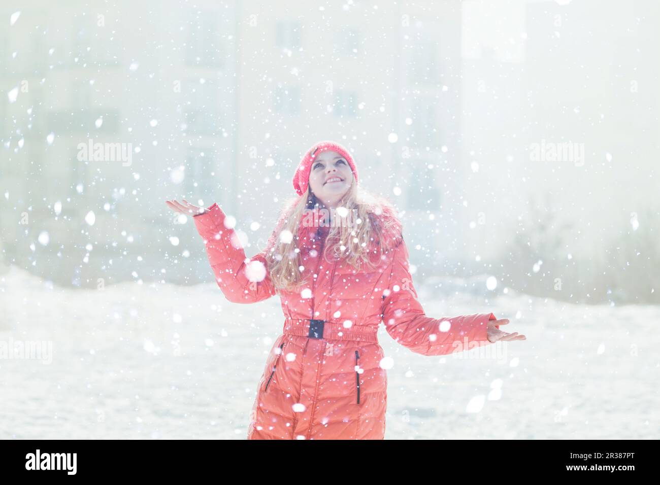 Girl in red parka Stock Photo - Alamy