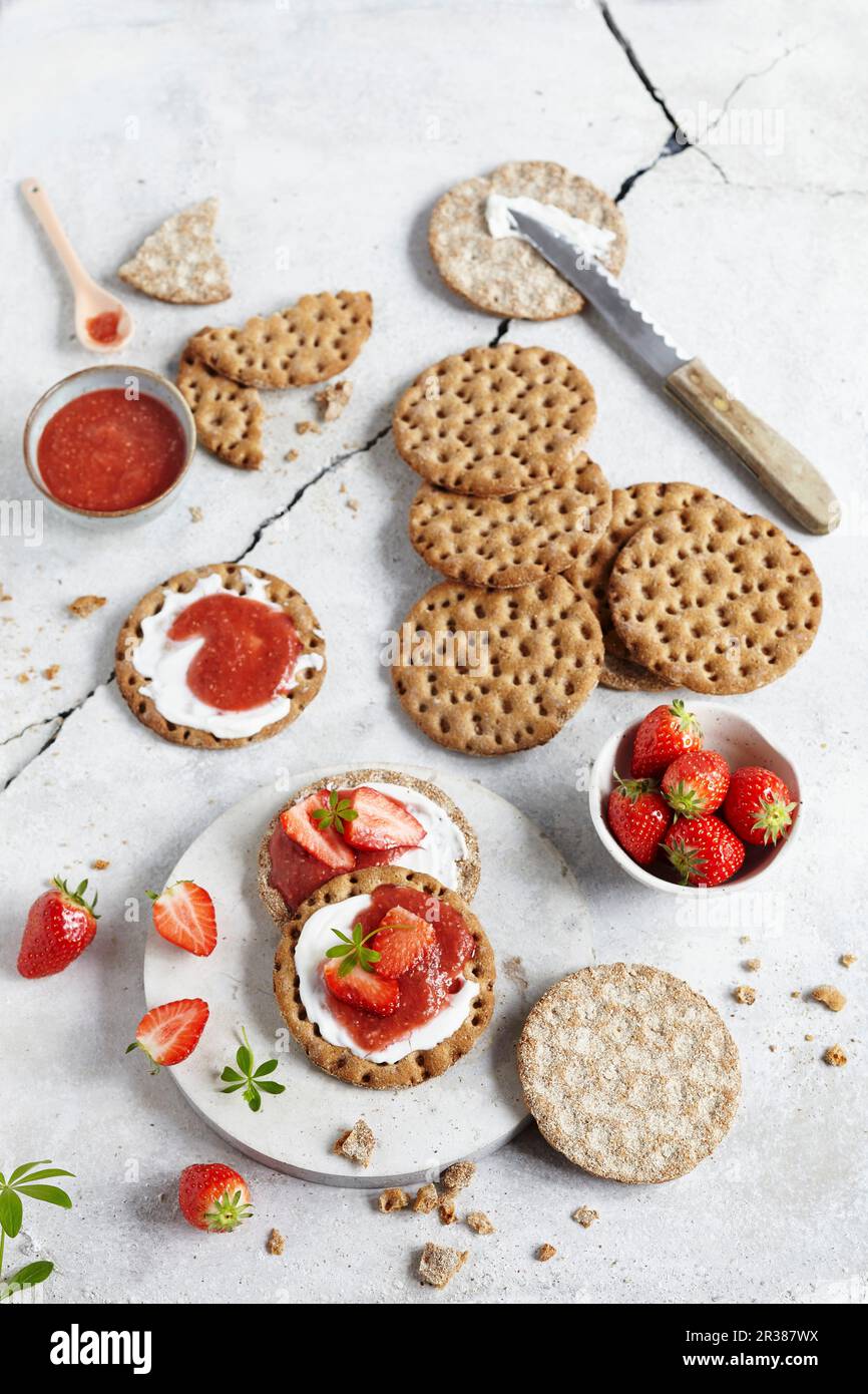 Crackers with strawberry and chia jam Stock Photo - Alamy