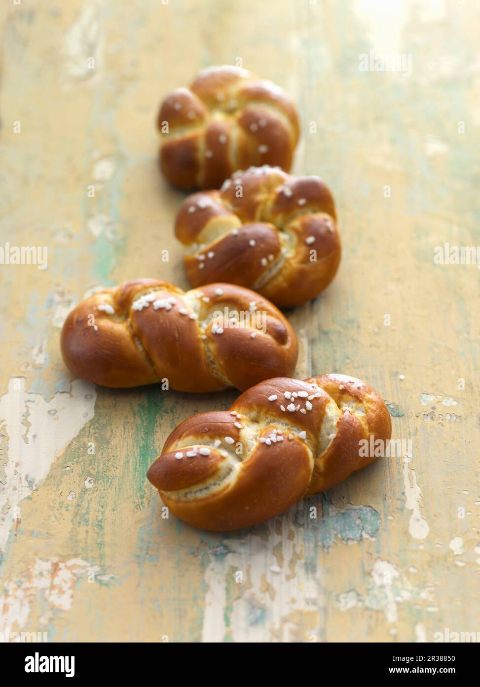 Lye bread plaits with salt Stock Photo - Alamy