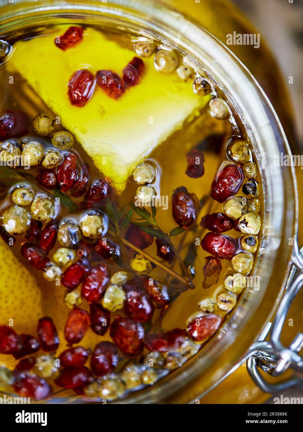 Pickled cheese in a glass jar Stock Photo - Alamy