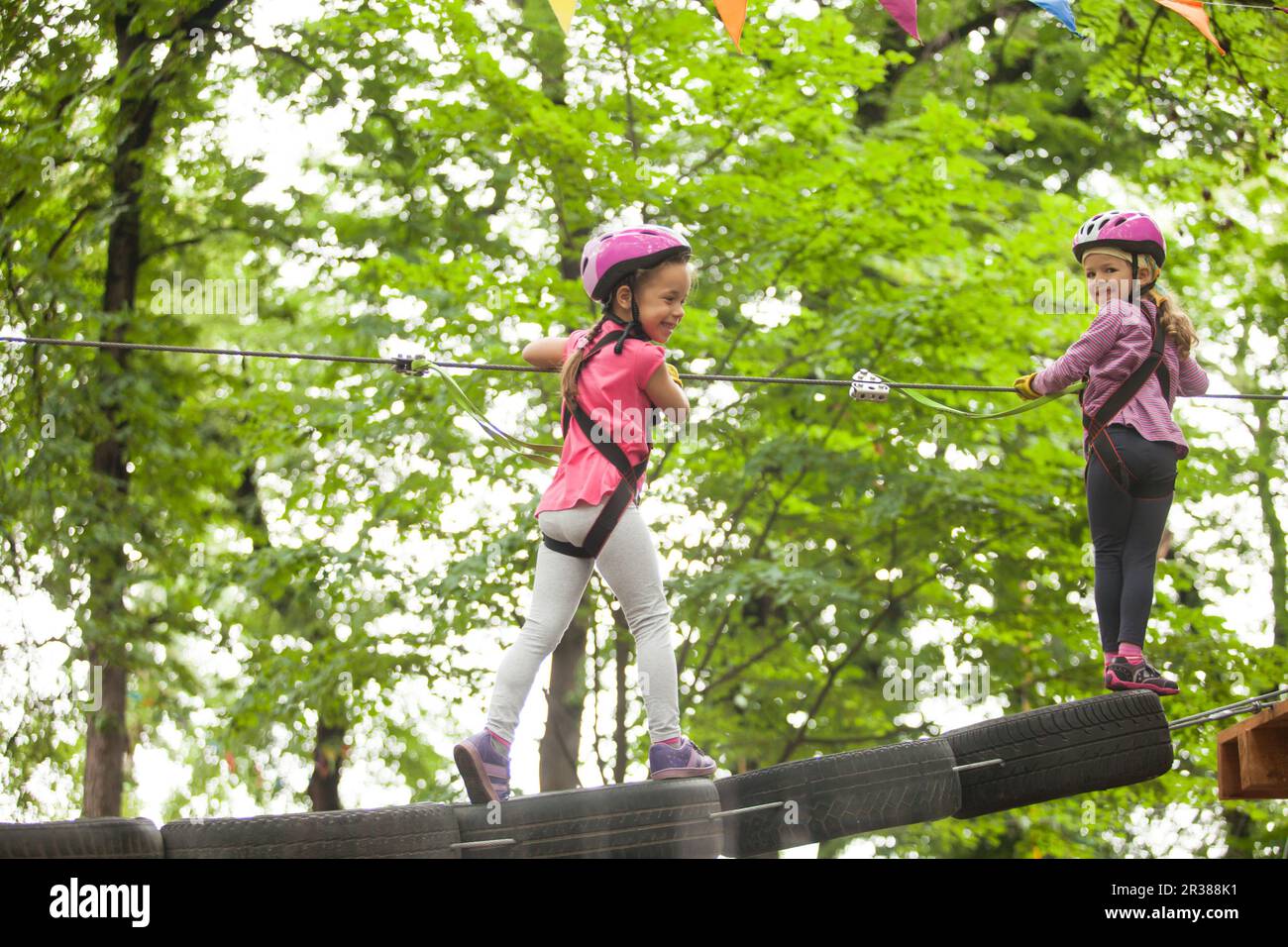 The obstacle course in adventure park Stock Photo - Alamy