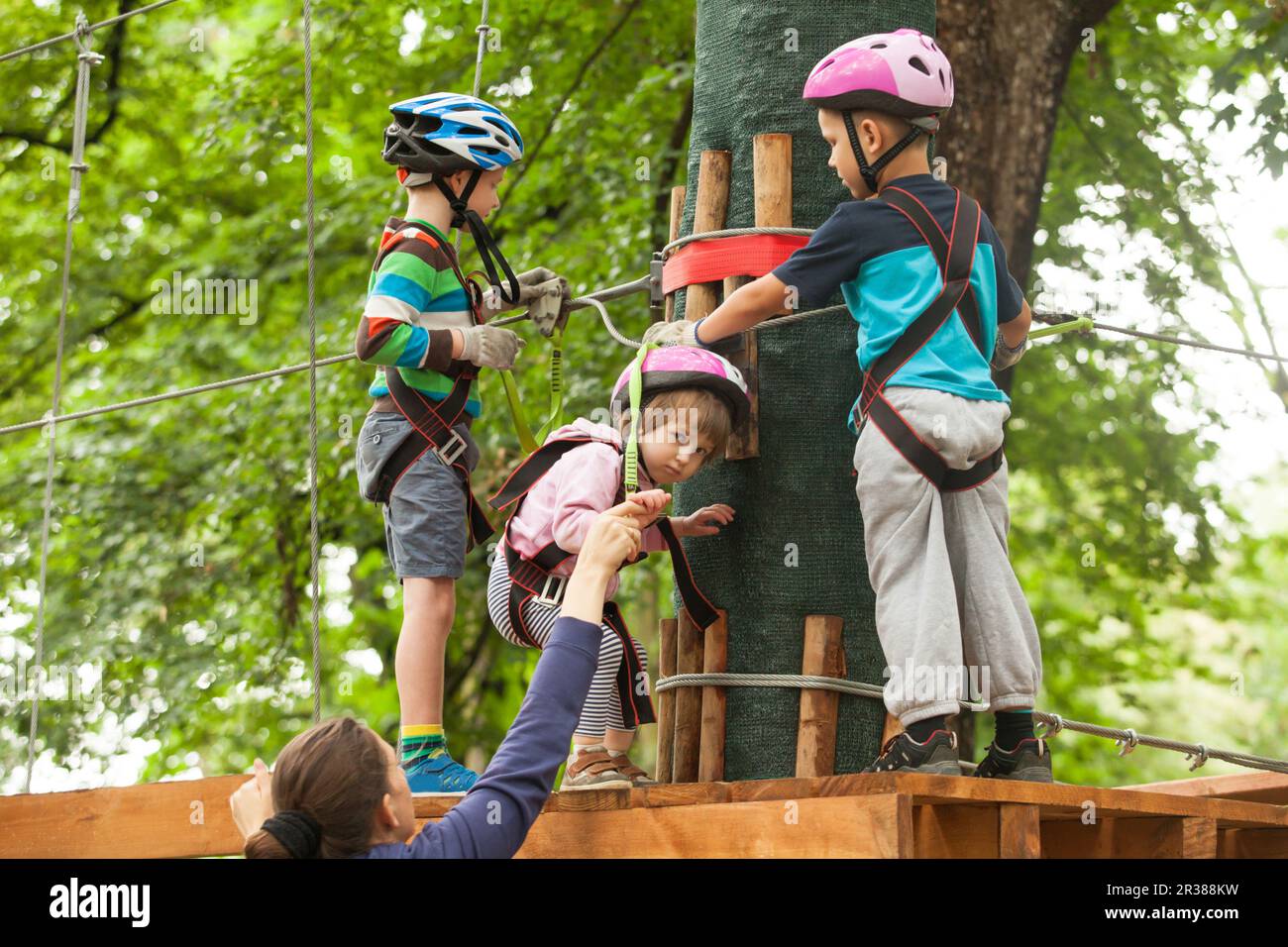 Children in a adventure playground Stock Photo - Alamy