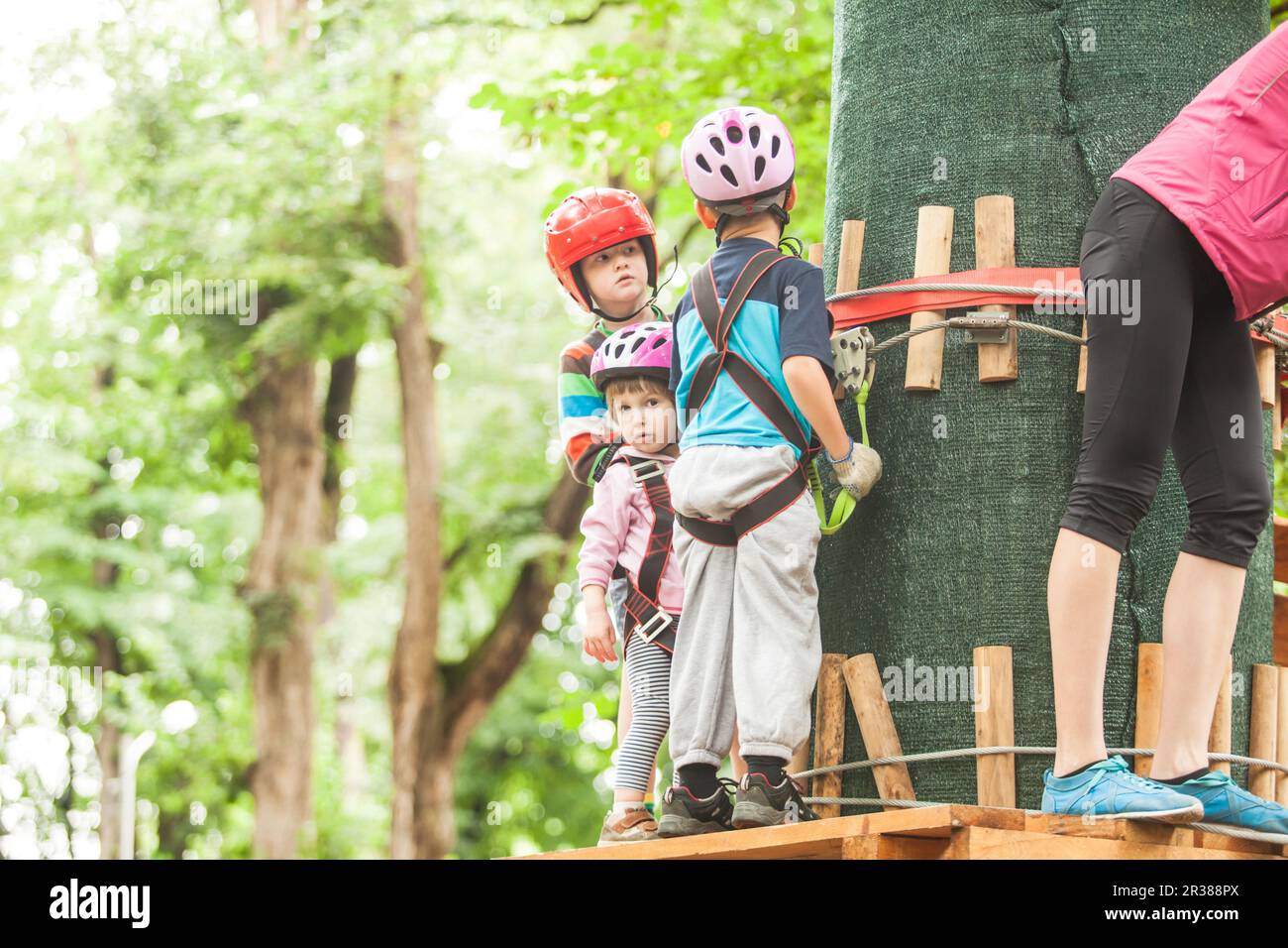 The obstacle course in adventure park Stock Photo - Alamy