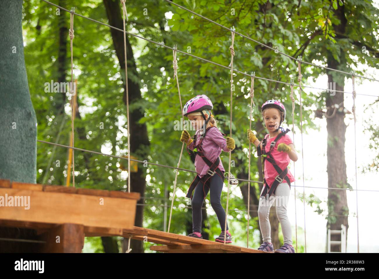 The obstacle course in adventure park Stock Photo - Alamy