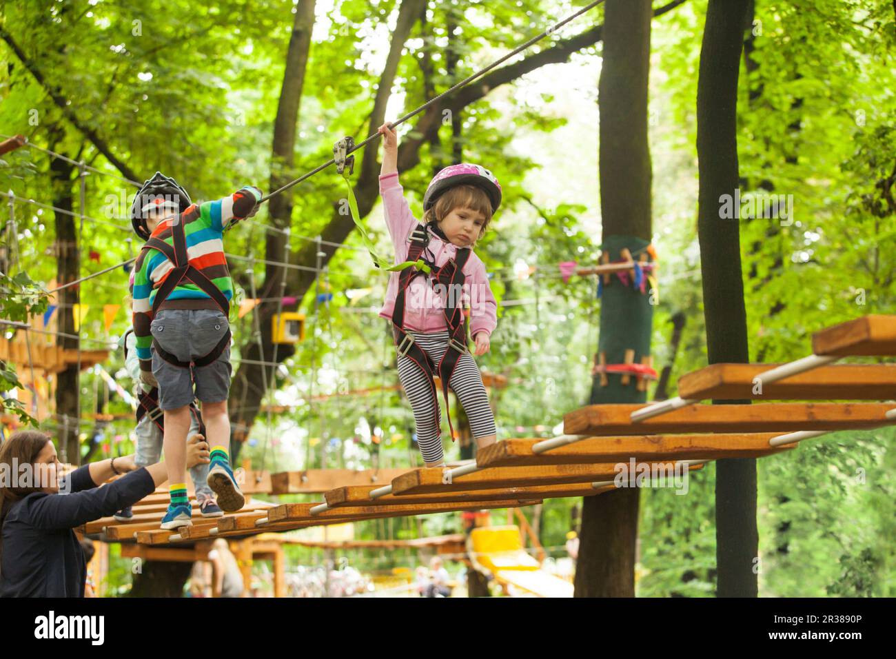 Children in a adventure playground Stock Photo - Alamy