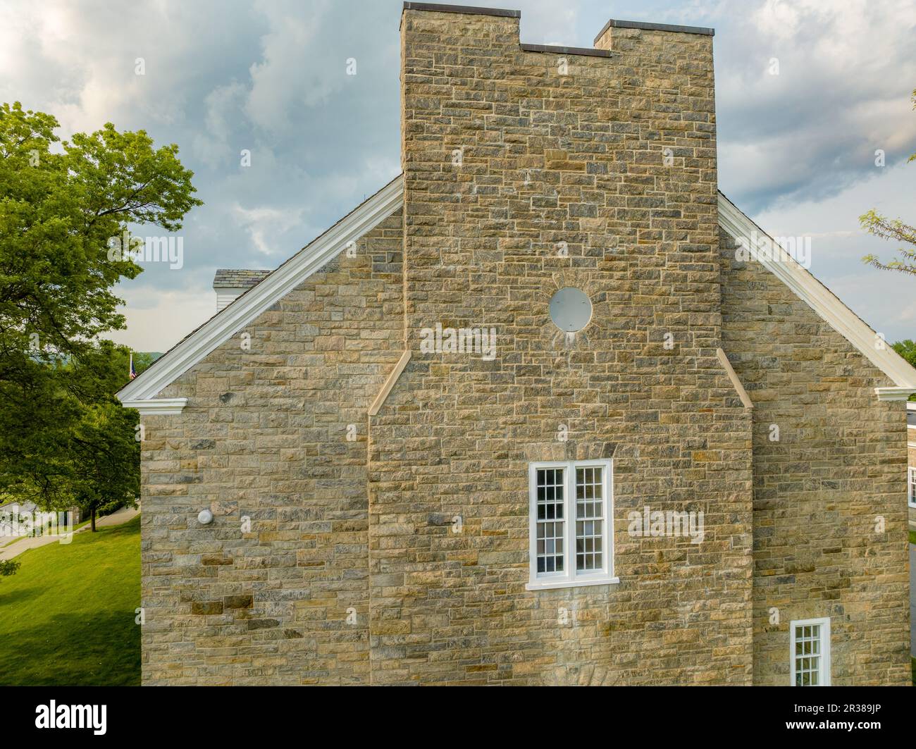 Exterior wall of an old stone building with built in chimney's Stock ...