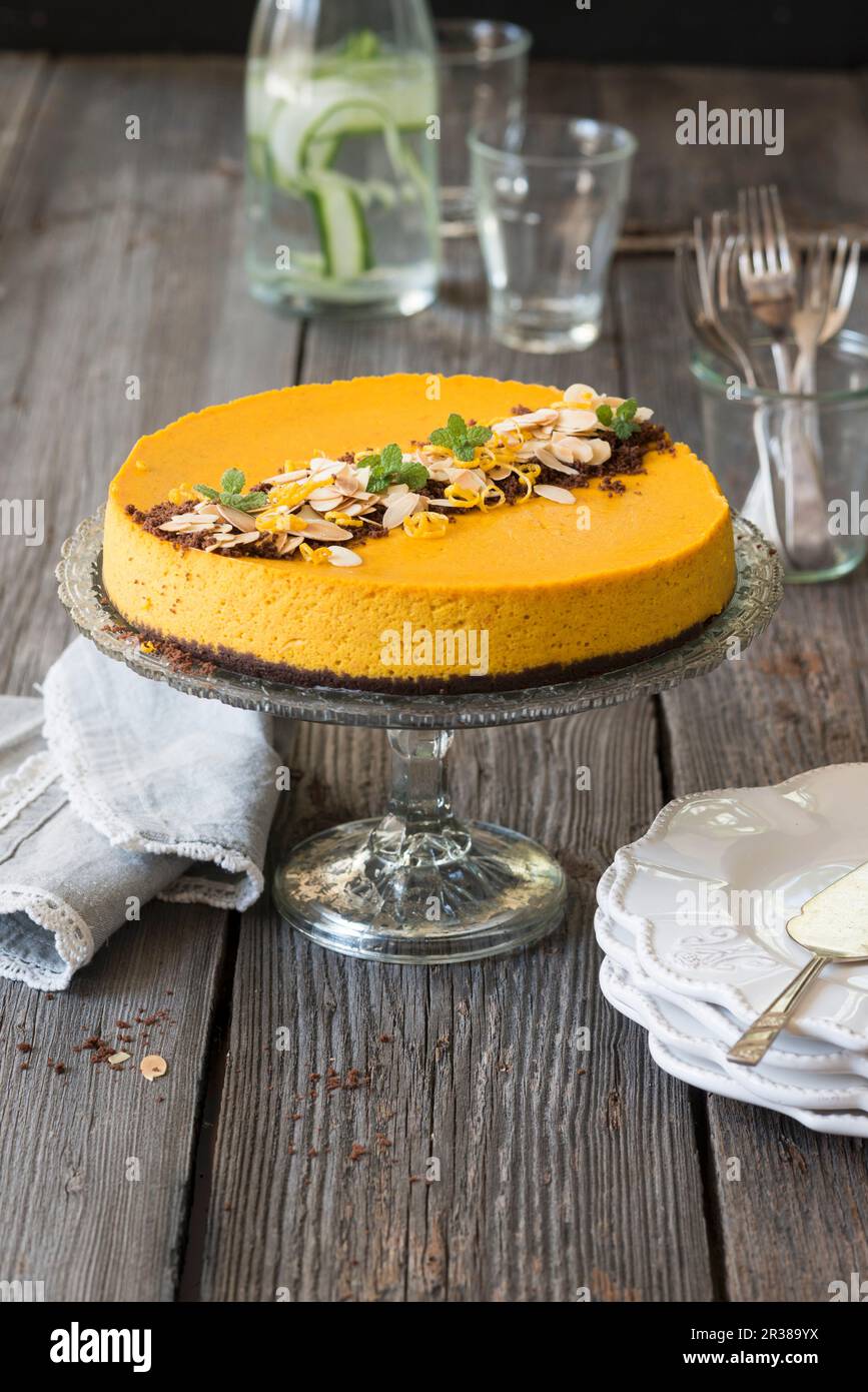 Chocolate and pumking cheesecake with toasted almonds Stock Photo - Alamy