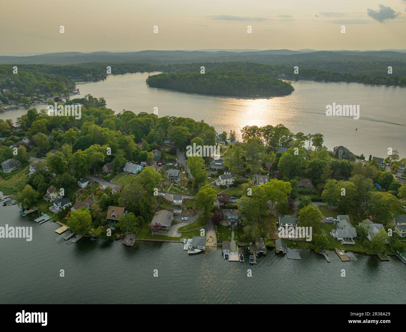 Late afternoon aerial photo of Lake Mahopac located in Town of Carmel ...
