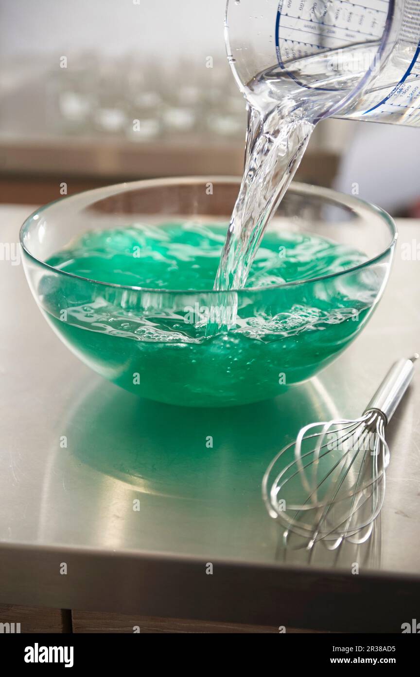 Add water to the jelly mixture Stock Photo - Alamy