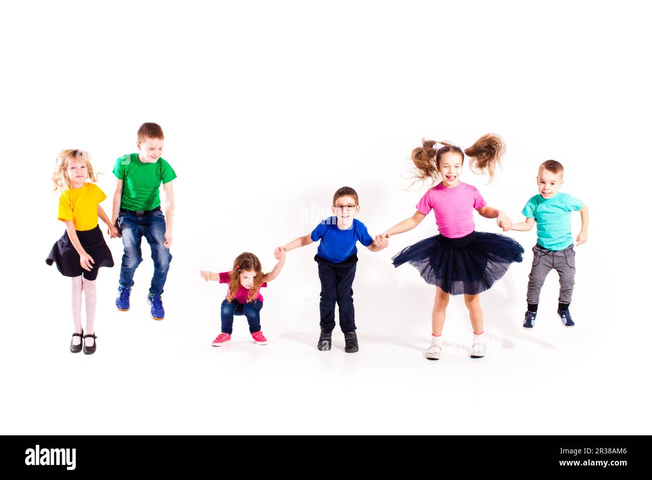 The happy kids jump Stock Photo - Alamy