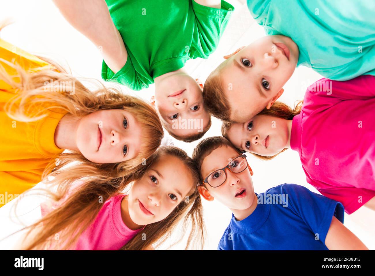 Kids faces in a round Stock Photo - Alamy
