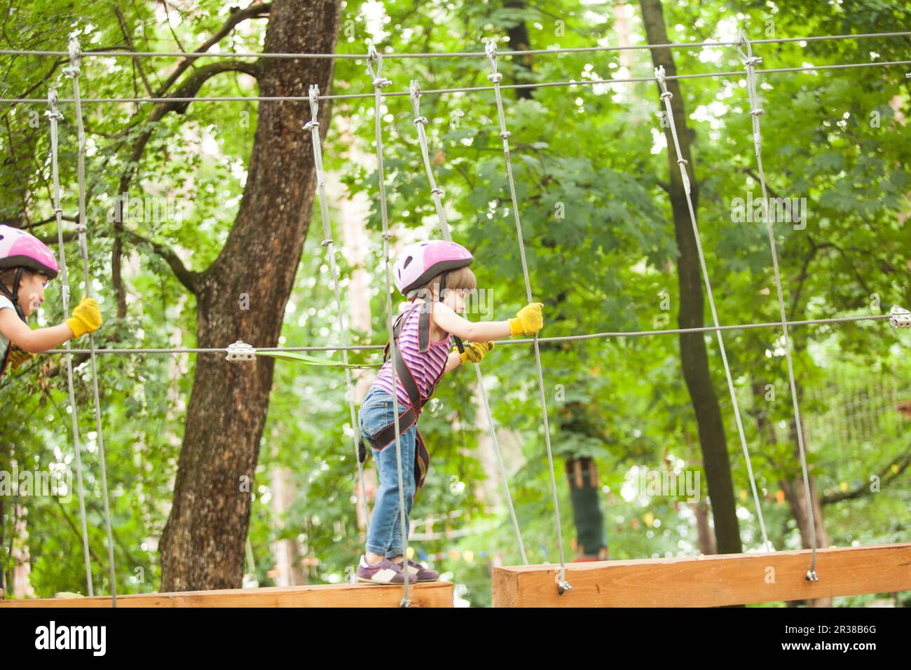 The obstacle course in adventure park Stock Photo - Alamy