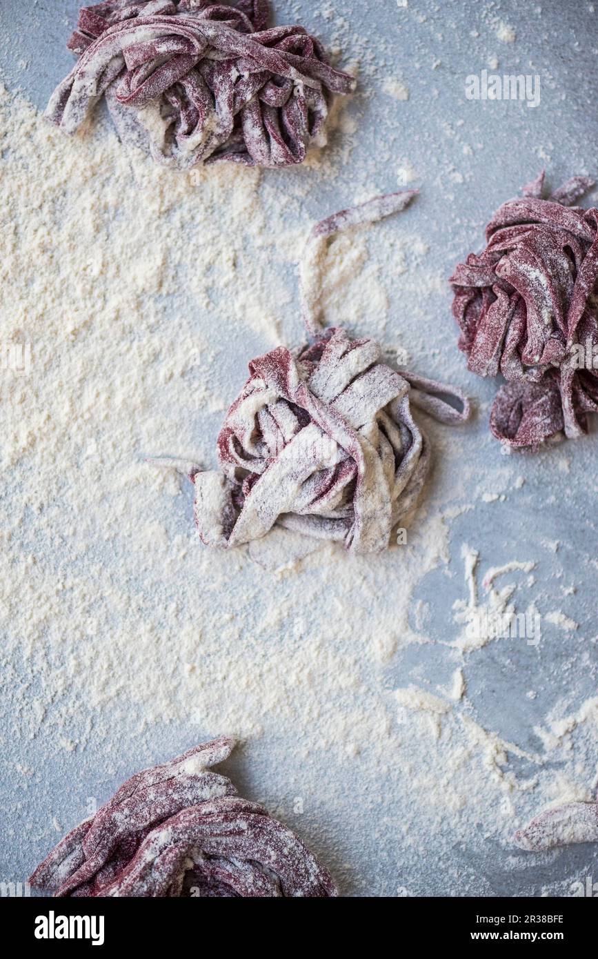 Homemade beetroot pasta Stock Photo - Alamy