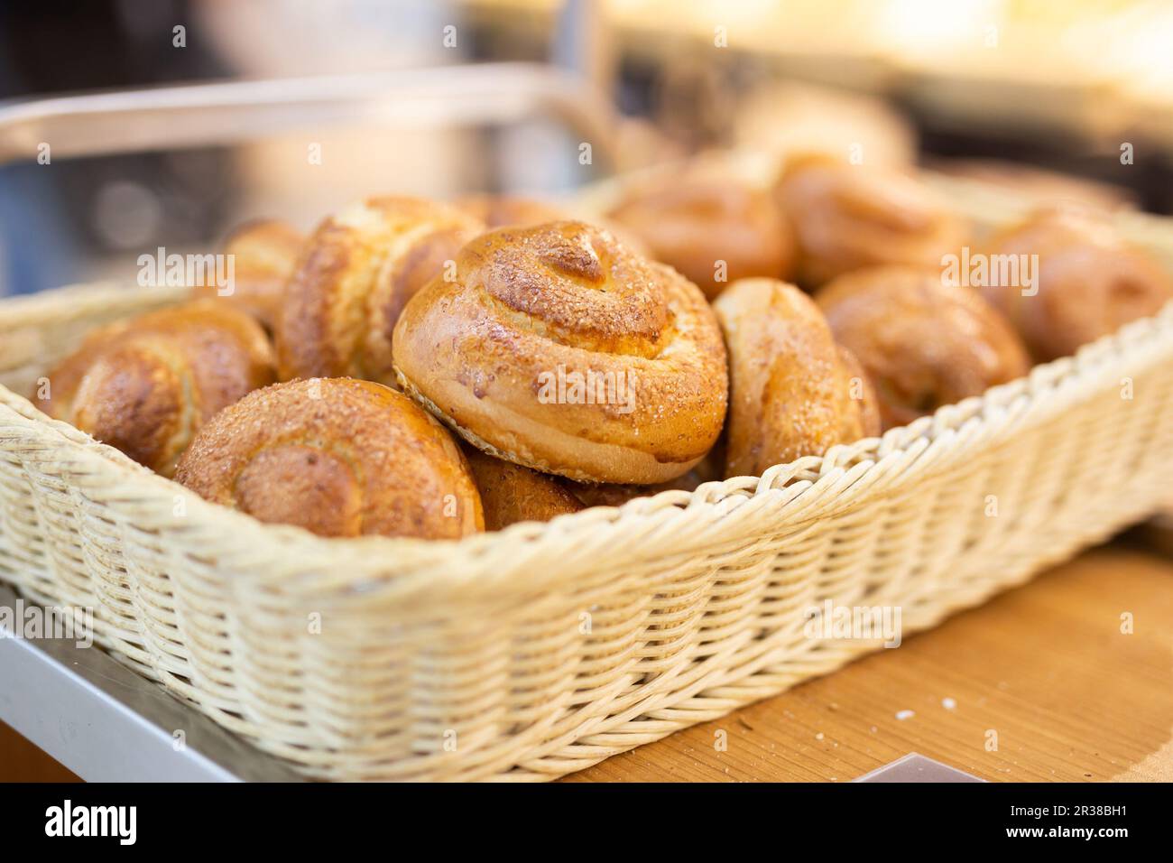 delicious fresh butter buns in baskets in bakery Stock Photo - Alamy