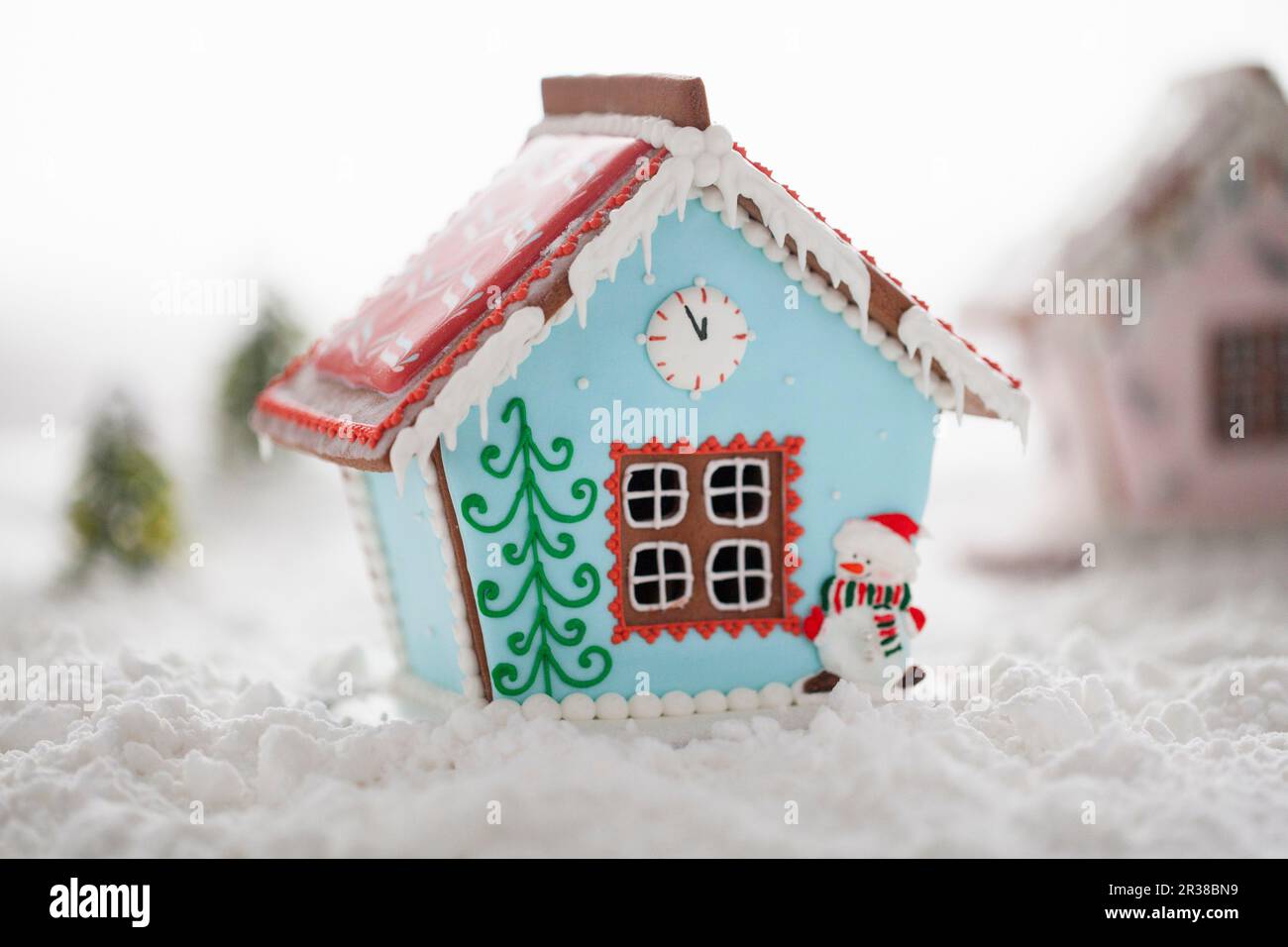 A gingerbread house with blue icing Stock Photo - Alamy
