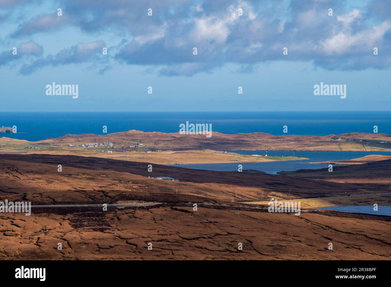 Bright sunny day over Weisdale Voe, Shetland, with sweeping views of ...