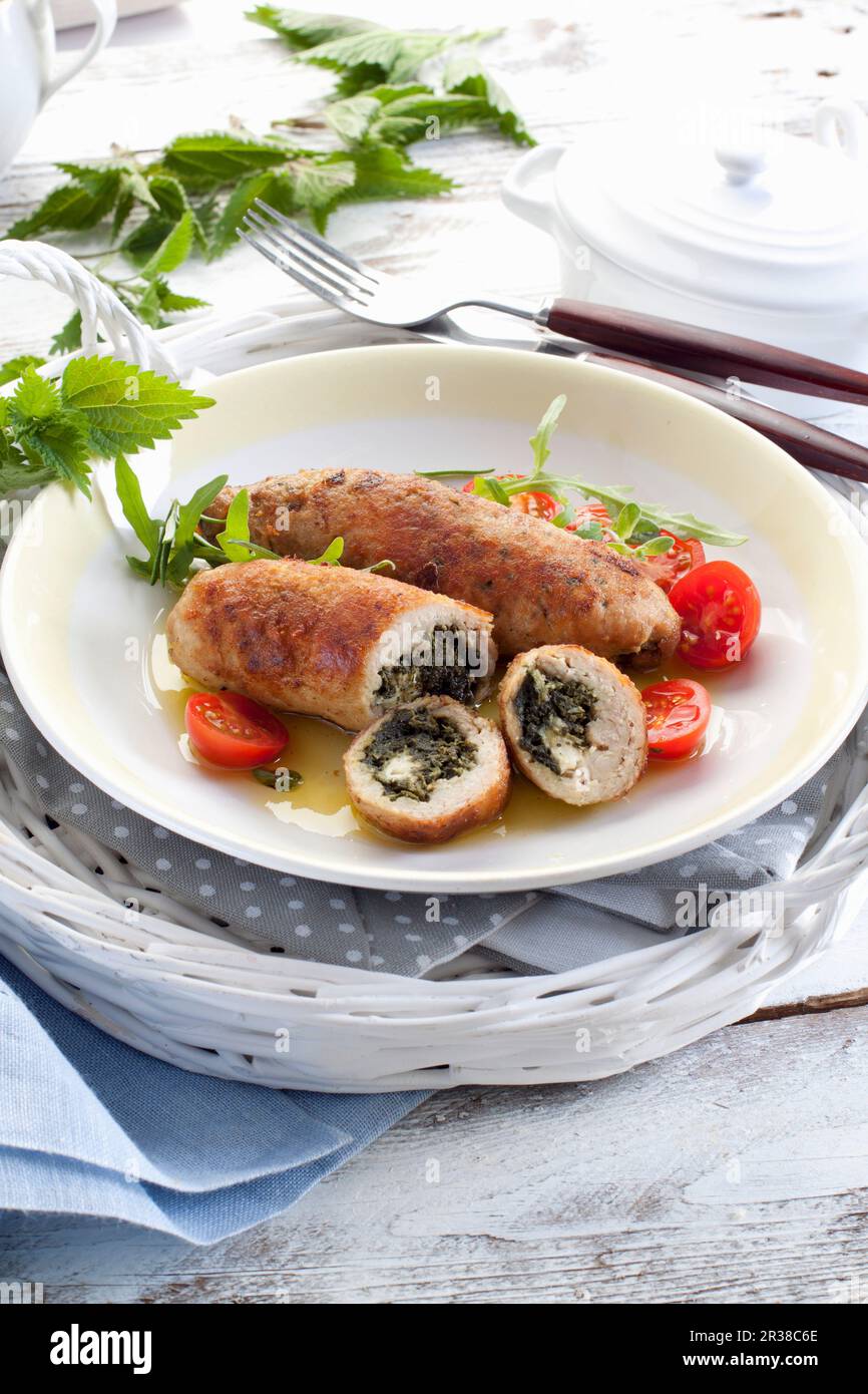 Chicken roulades with nettle stinging nettle filling Stock Photo - Alamy
