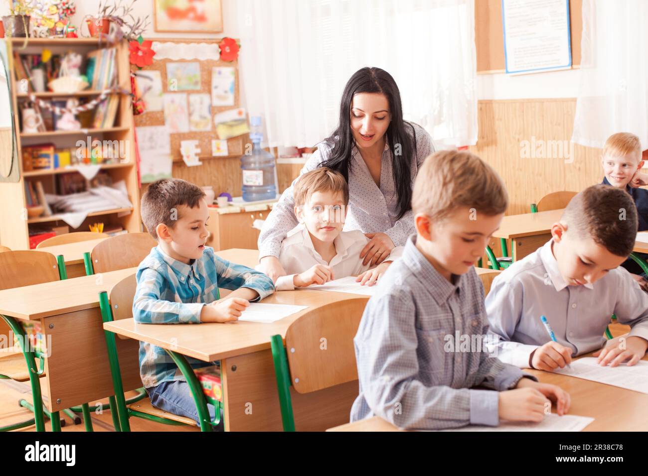 Teacher starts the lesson Stock Photo - Alamy