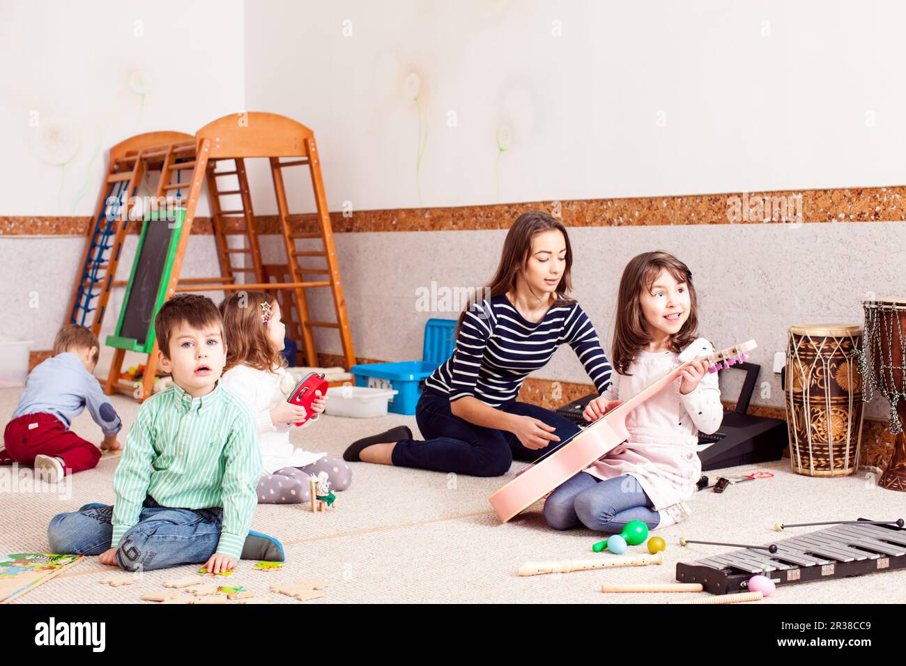 Music making lesson Stock Photo - Alamy