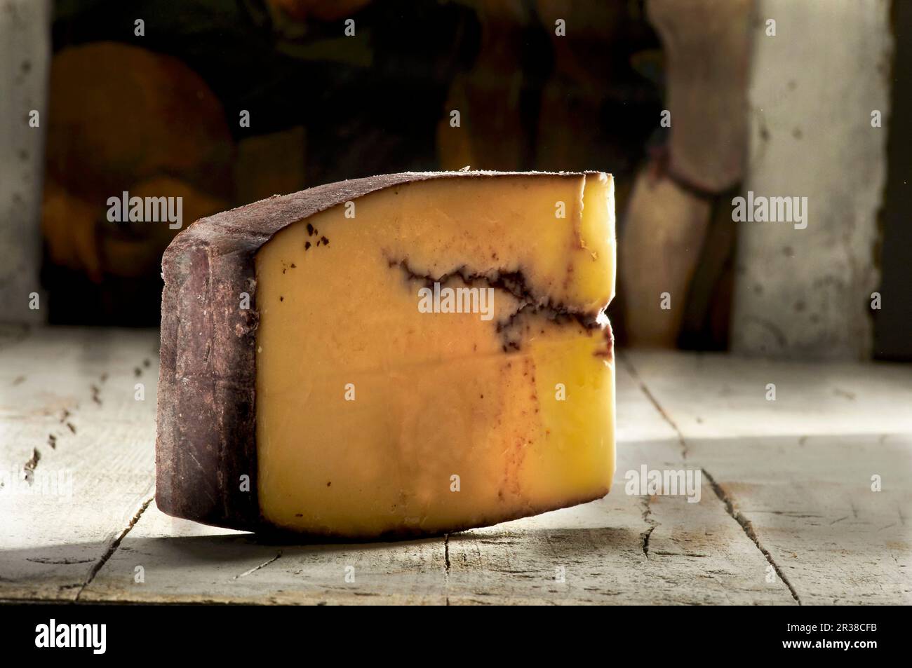Cheese with a red wine rind Stock Photo - Alamy