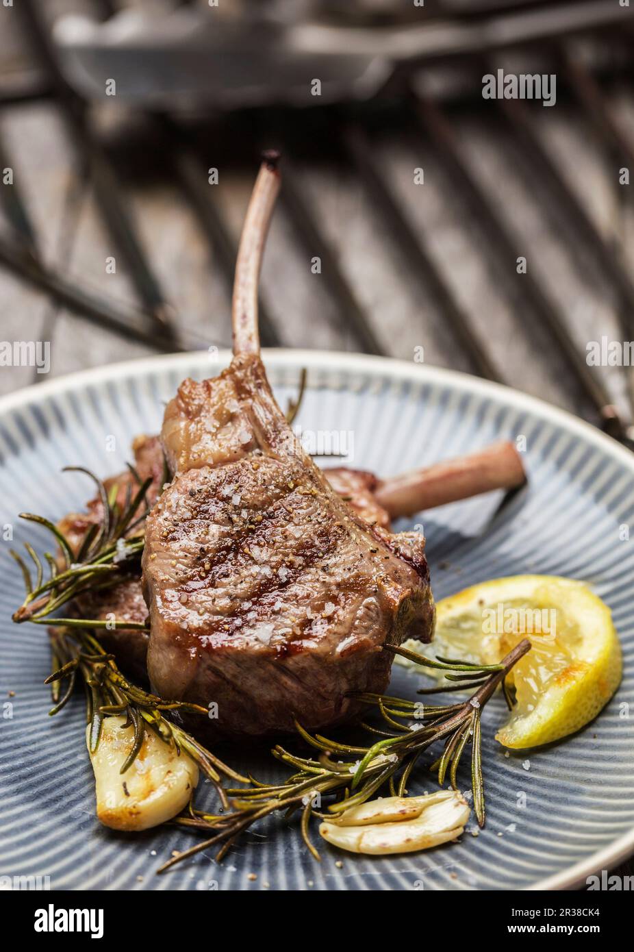 Grilled rack of lamb with rosemary, lemon and garlic Stock Photo - Alamy