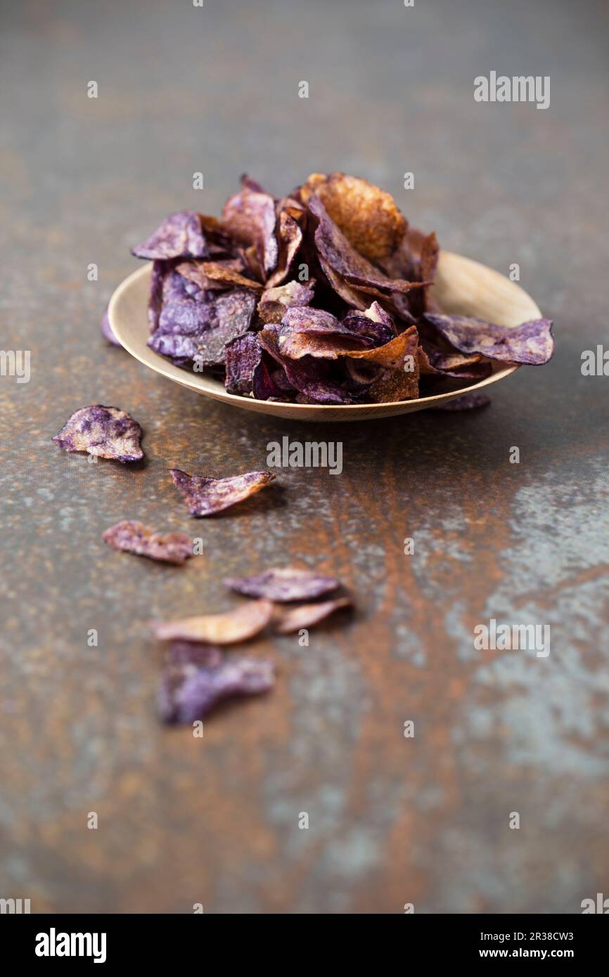 Purple potato chips Stock Photo - Alamy