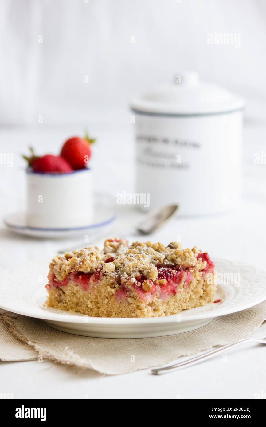Strawberry cake with nut crumble topping Stock Photo - Alamy