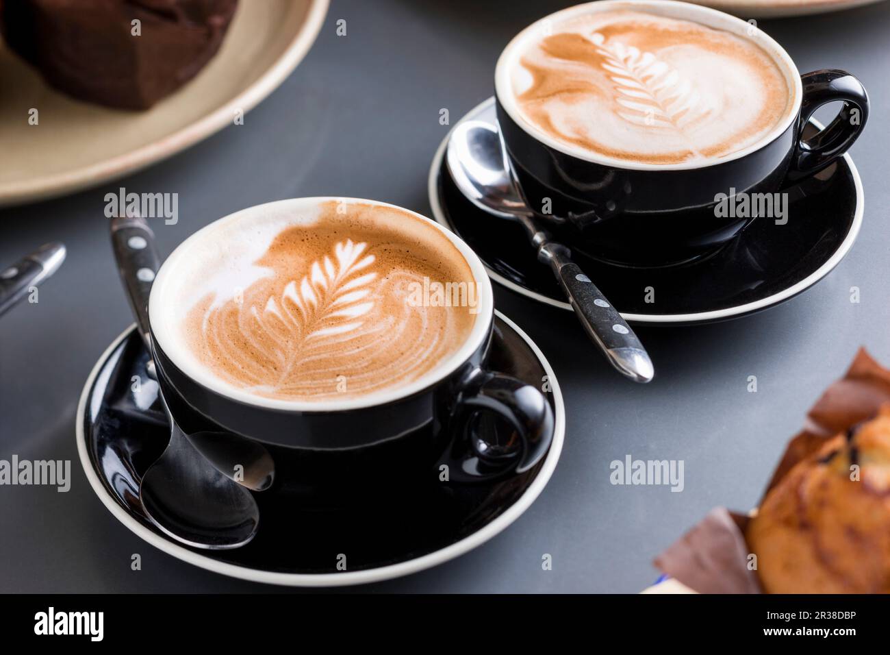 Two cups cappuccino decorated hi-res stock photography and images - Alamy