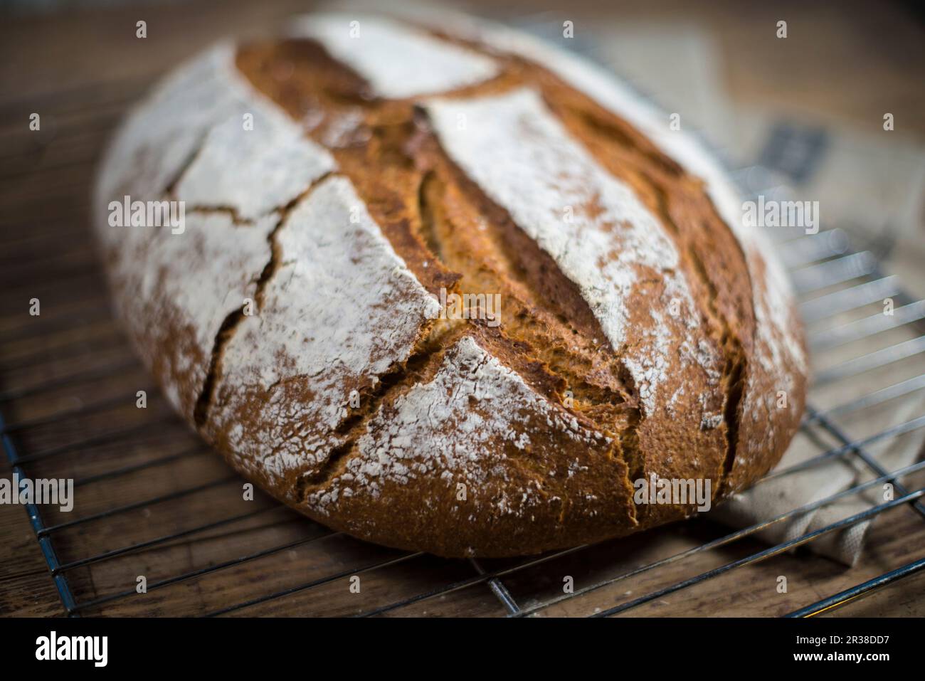 Sourdough bread on a wire rack Stock Photo - Alamy
