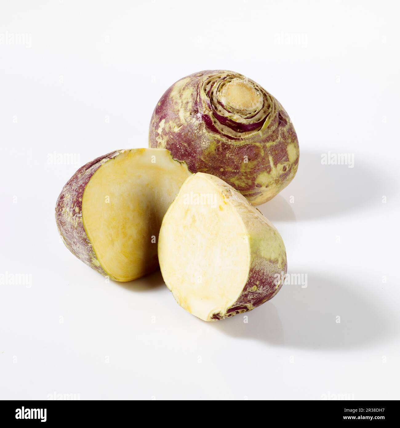 Turnips, whole and halved, on a white surface Stock Photo - Alamy