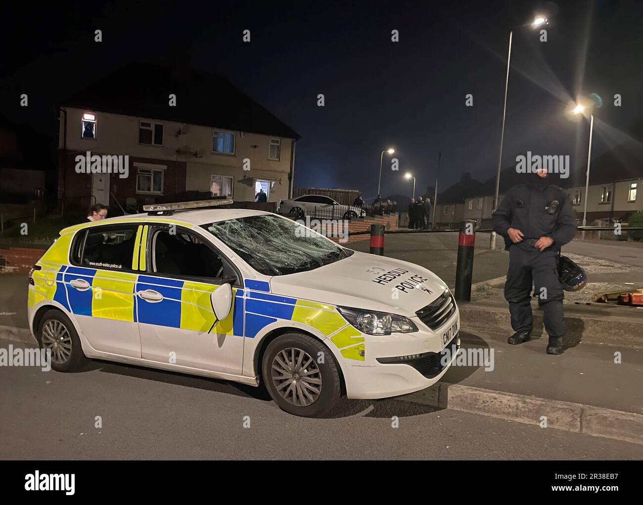 A police car with a smashed windsrceen in Ely, Cardiff, during a "large ...