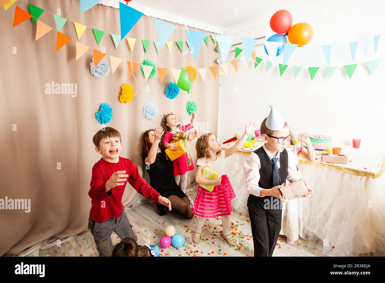 Children rejoice at the feast Stock Photo - Alamy