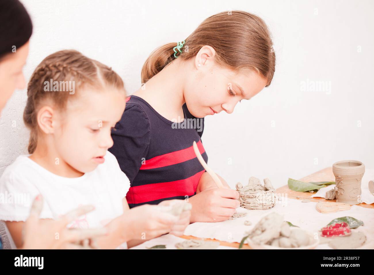 Child with busy hands hi-res stock photography and images - Alamy