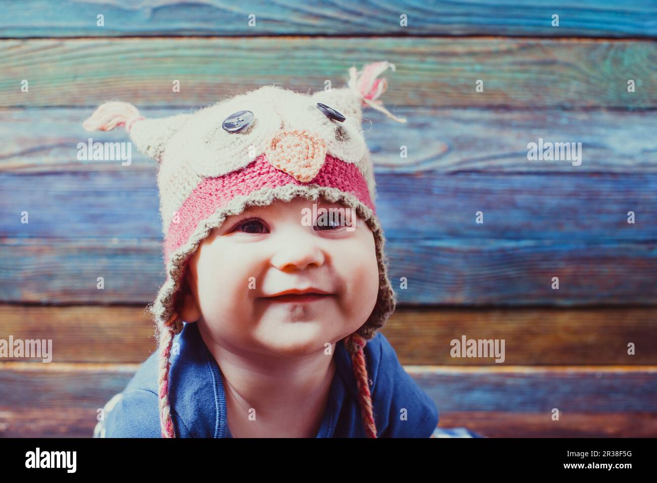 Little baby in a funny hat Stock Photo - Alamy