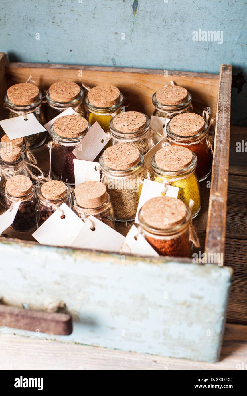 Spices in vintage bottles Stock Photo - Alamy