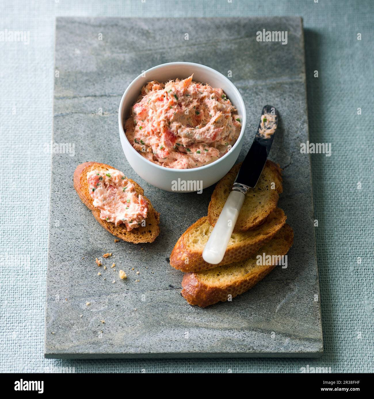 Salmon rillette with toasted baguette Stock Photo - Alamy
