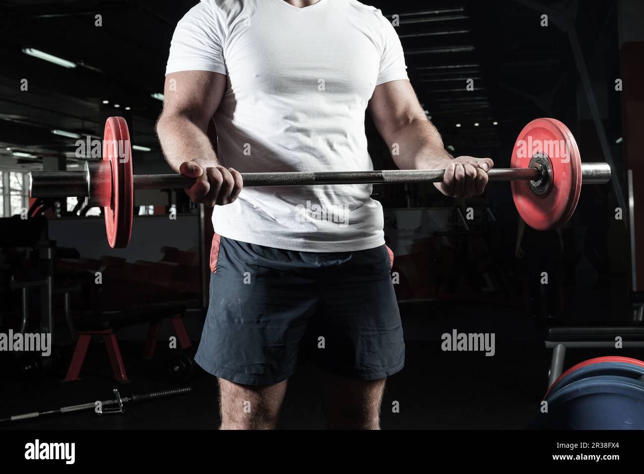 Young athlete lifts heavy barbell hi-res stock photography and images ...