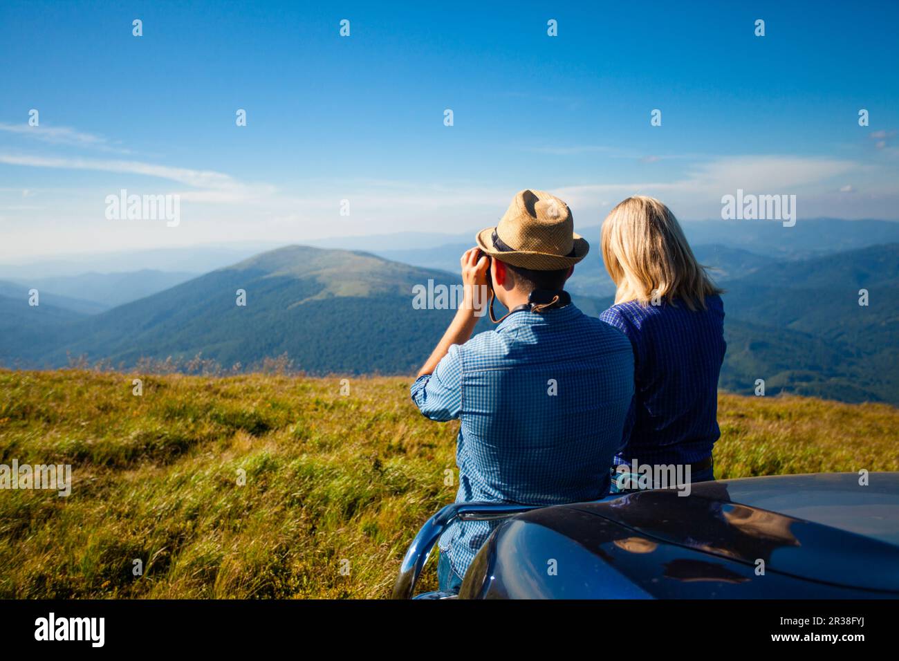 Woman top mountain enjoying view hi-res stock photography and images ...