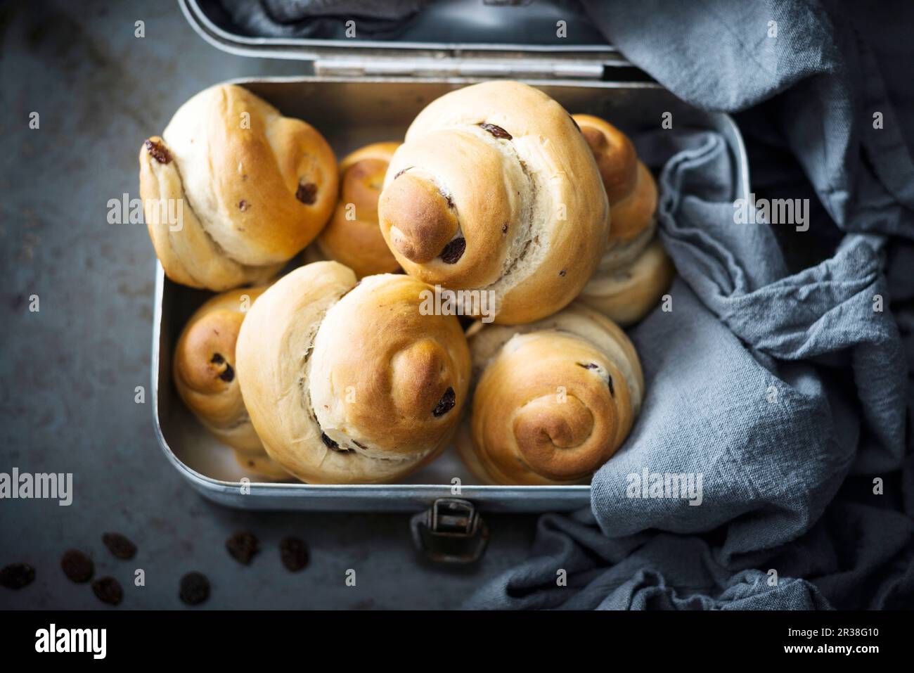 Vegan raisin buns in a tin box Stock Photo - Alamy