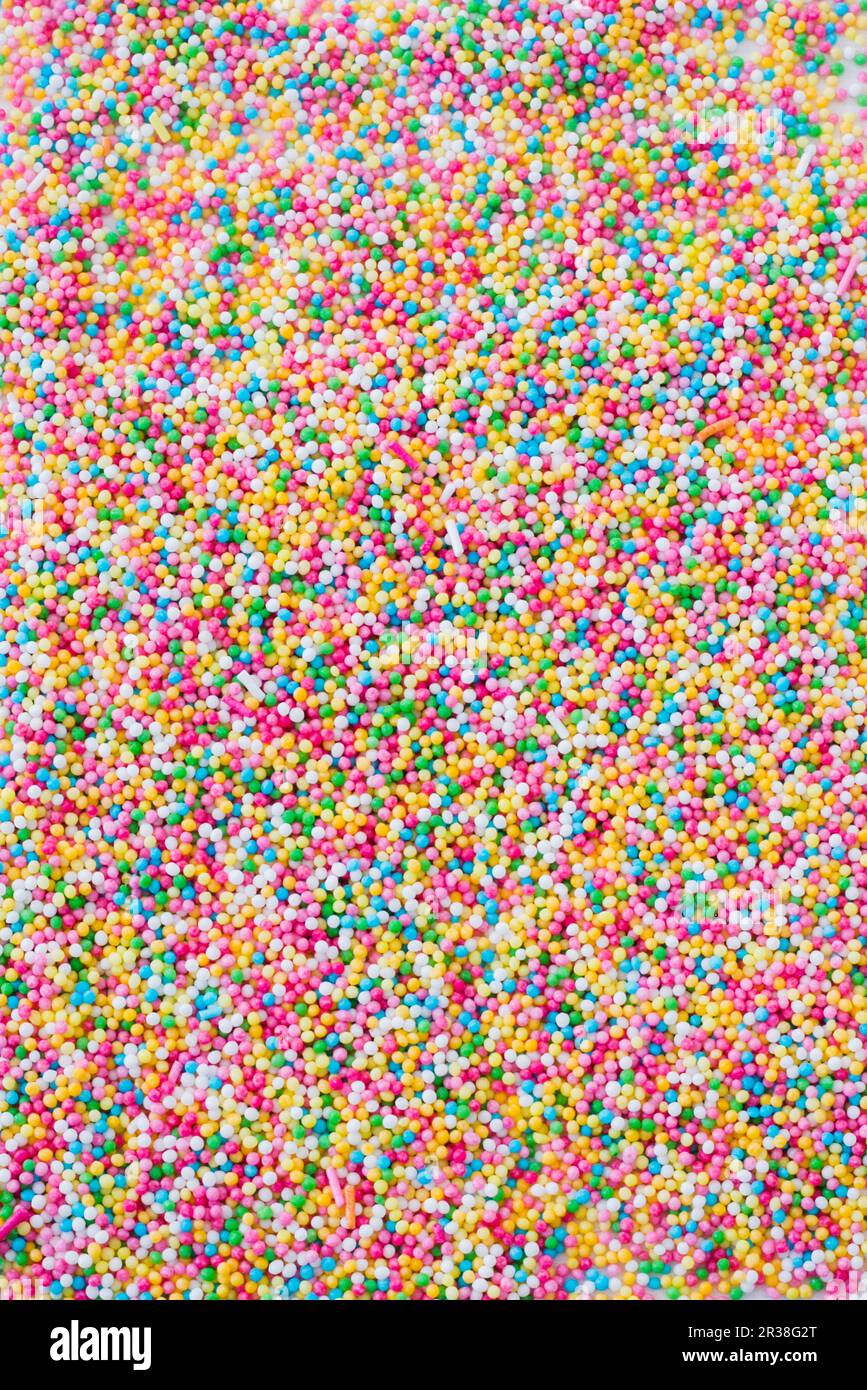 Multi coloured sprinkles background hi-res stock photography and images ...