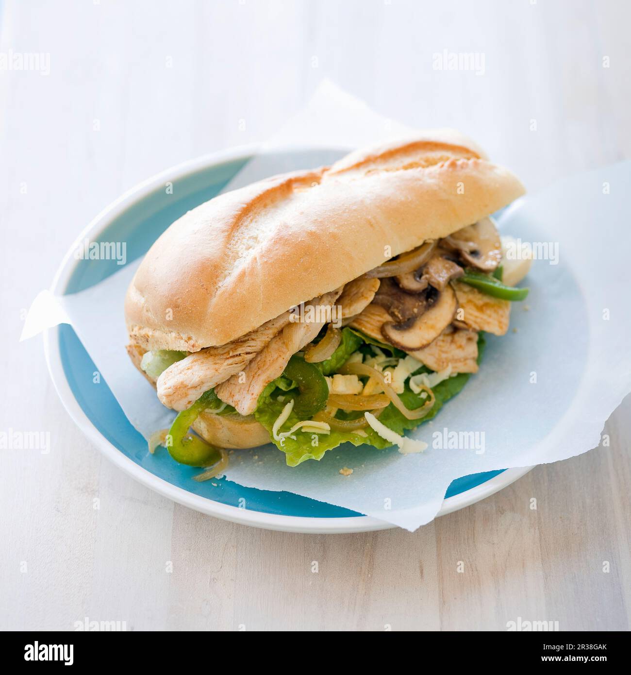 Chicken submarine sandwich with onions, mushrooms and bellpepper Stock ...