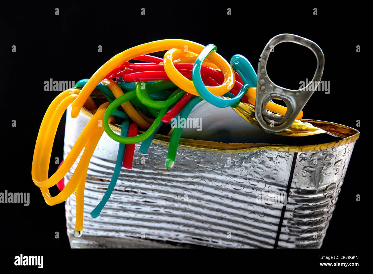 Different coloured spaghetti in a tin Stock Photo - Alamy